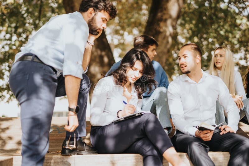 University Students Sharing Knowledge and Working Together on Projects ...