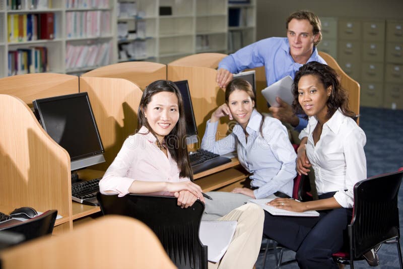 University Students Using Computer in Library Stock Image - Image of ...