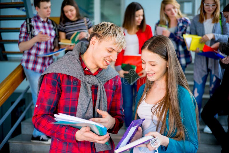 One of the Students Meets His Classmate and they Start Discussing Their ...