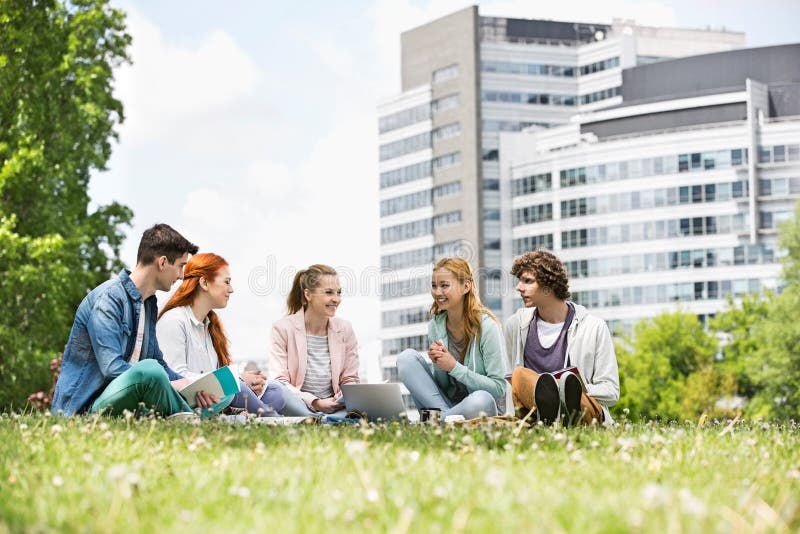University Students Studying Together on Campus Ground Stock Image ...
