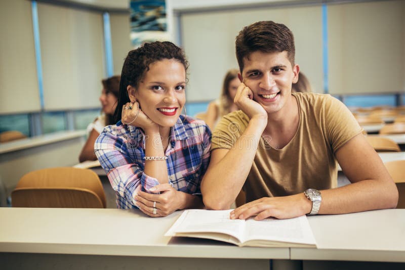 Students Studying Together in Classroom Stock Image - Image of male ...
