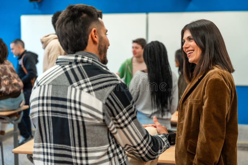 University Students Talking with Their Teacher after Class Stock Image ...