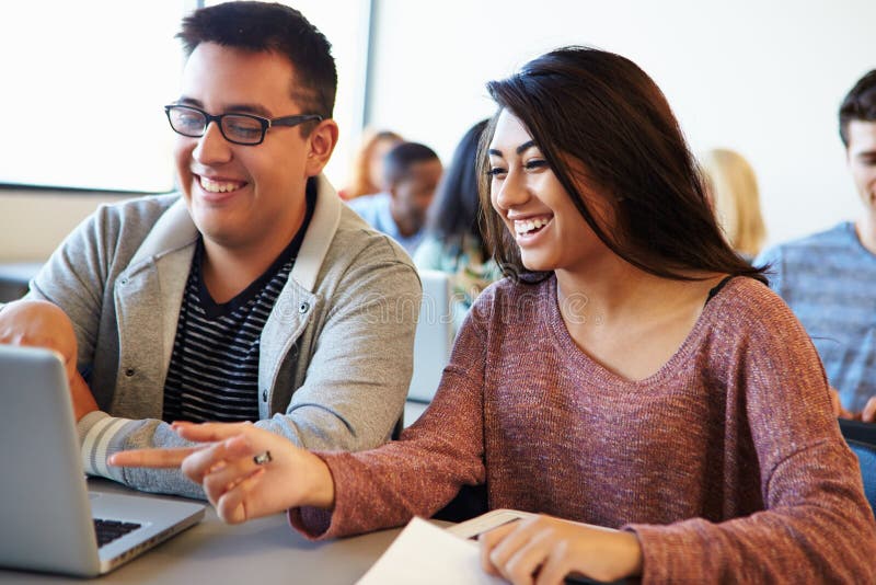 University Students Using Digital Tablet and Laptop in Class Stock ...