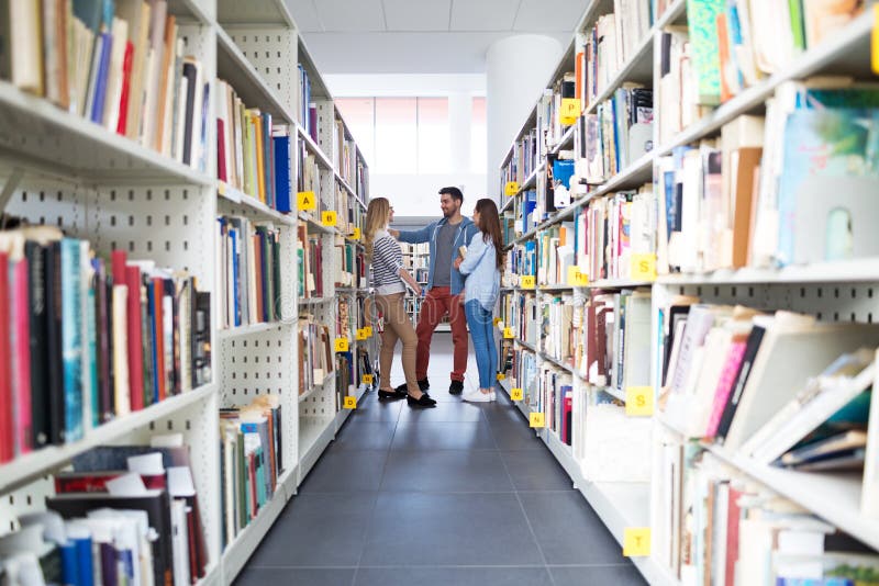 Students Working in the Library at Campus Stock Image - Image of ...