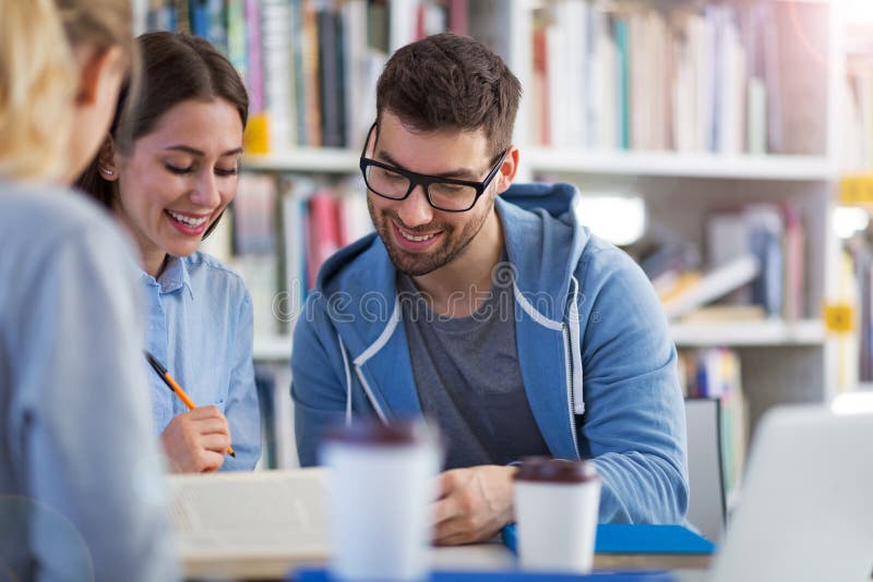 Students Working in the Library at Campus Stock Image - Image of ...