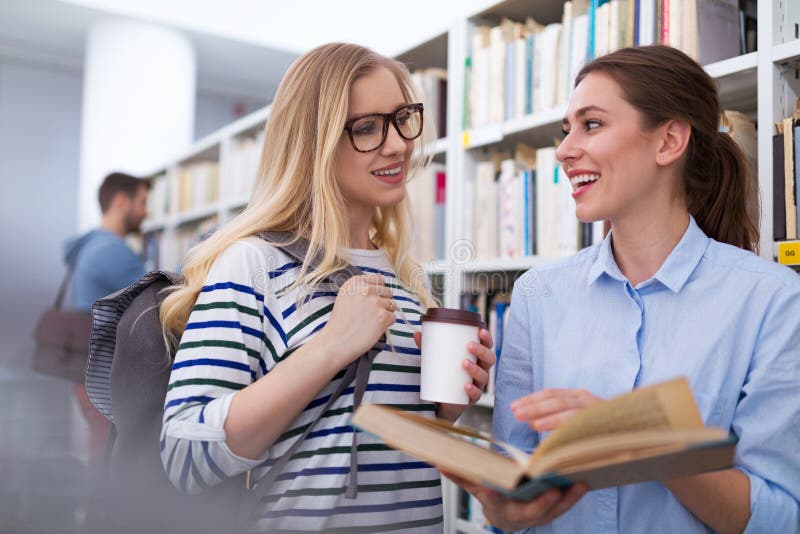 Students Working in the Library at Campus Stock Image - Image of casual ...