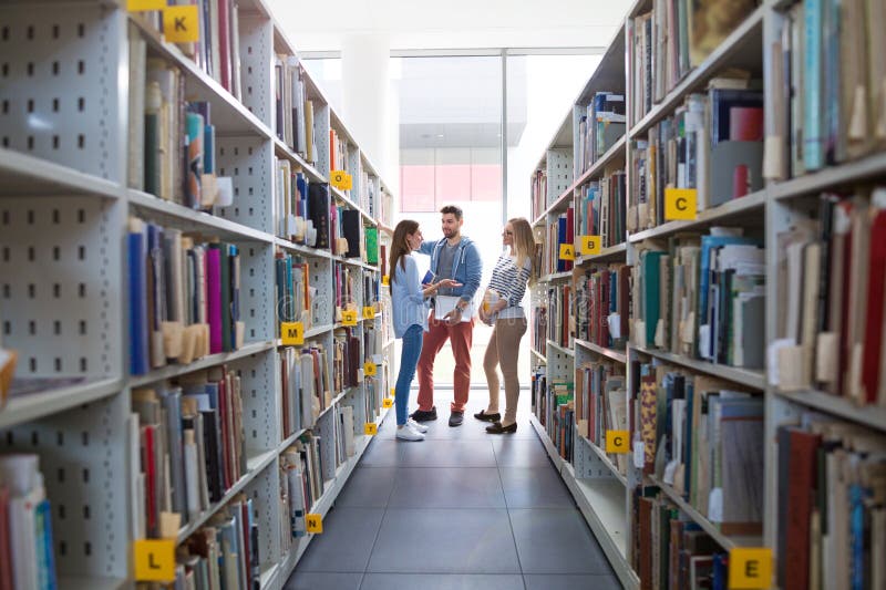 Students Working in the Library at Campus Stock Image - Image of ...