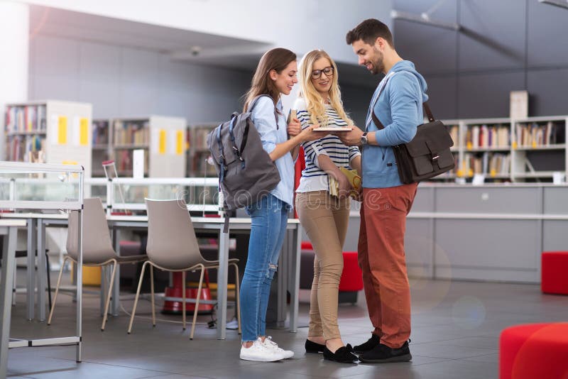 Students Working in the Library at Campus Stock Image - Image of ...