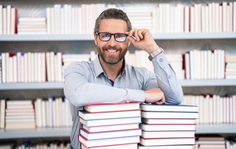 University Teacher Professor in School Classroom Library Preparing for ...
