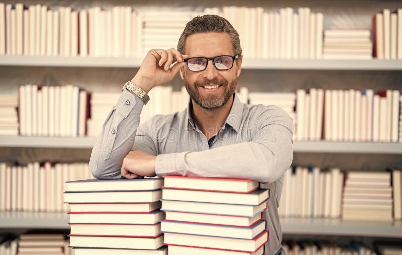 University Teacher Professor in School Classroom Library Preparing for ...