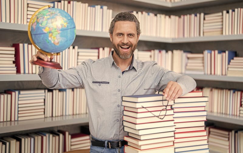 University Teacher Professor in School Classroom Library Preparing for ...