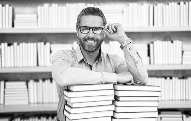 University Teacher Professor in School Classroom Library Preparing for ...