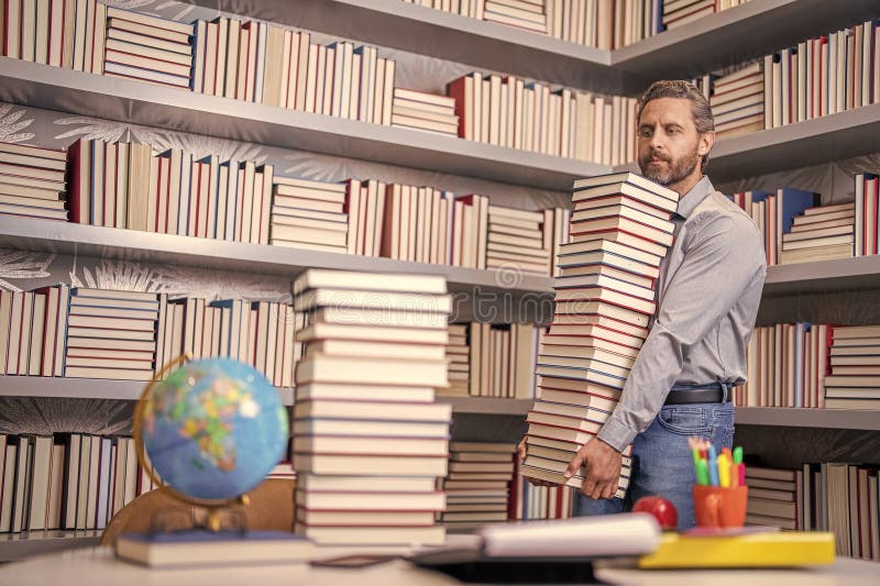 University Teacher Professor in School Classroom Library Preparing for ...