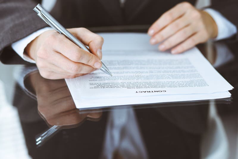 Unknown Female Hands with Pen Over Document of Contract. Agreement ...