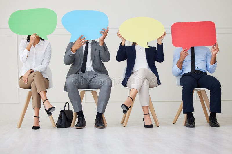 Unknown Group of Diverse Businesspeople Holding Speech Bubble while ...