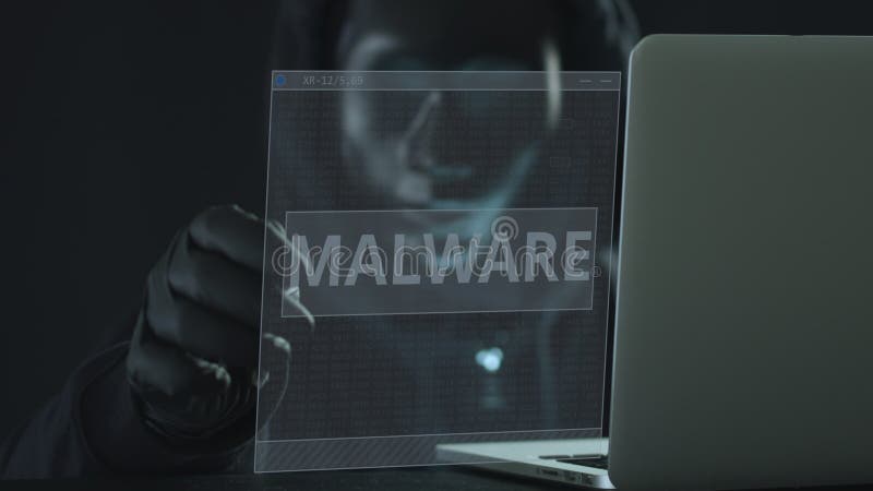 Unknown Hacker Wearing Black Mask Pulls MALWARE Tab from a Laptop ...
