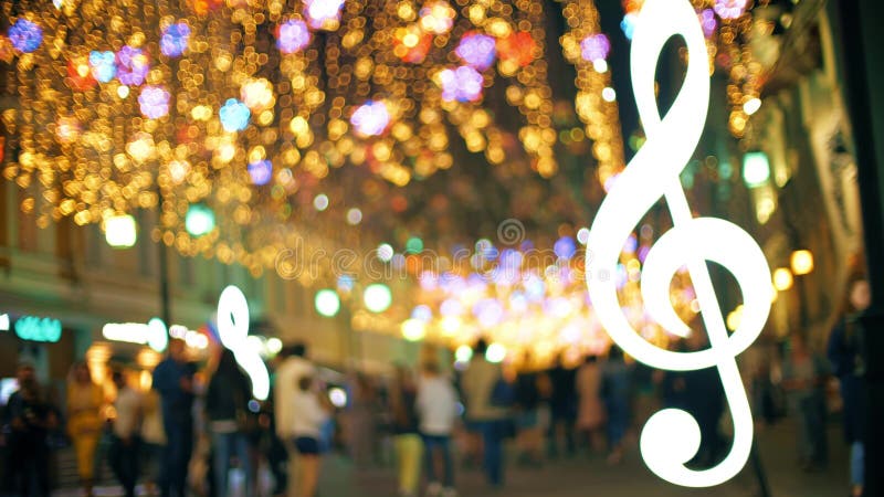Unknown People Walking Along Brightly Illuminated Pedestrian Street at ...