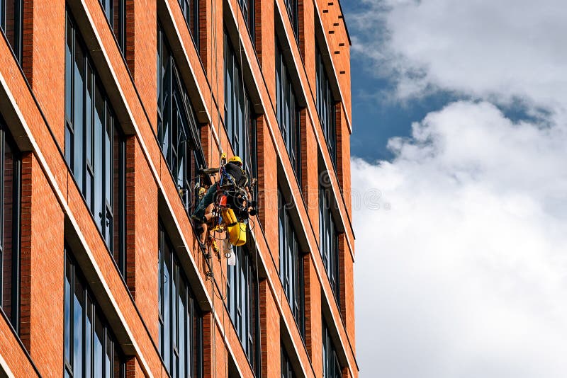 Industrial Climbers Washing Windows Stock Image - Image of climb ...