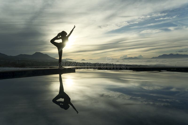 Unknown Woman Practicing Yoga at the Poolside Stock Photo - Image of ...