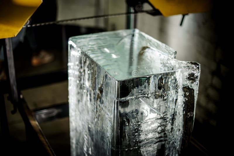 Unlighted Big Ice Cube and Yellow Equipment Element on the Plant Stock ...