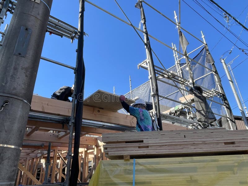 Unloading Building Materials at the Construction Site of a New House in ...