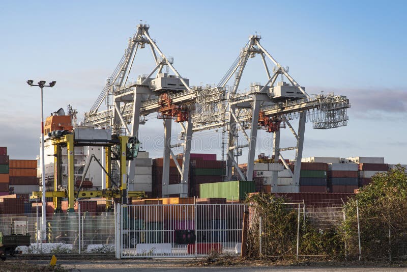 Unloading of Containers on a Quay Stock Image - Image of dock ...