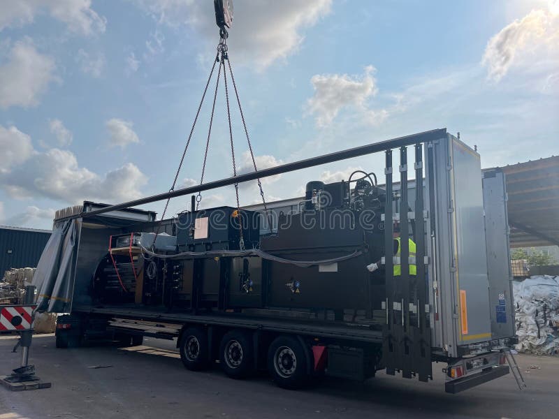 Unloading by Crane through the Roof of a Large Compression Press from a ...