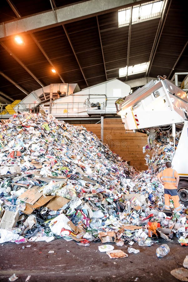 Unloading a Dump Truck of Waste into a Storage Room before Recycling ...