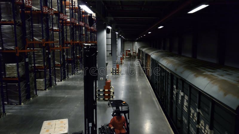 Unloading of Freight Trains. Creative. Parked Wagons with Goods in the ...