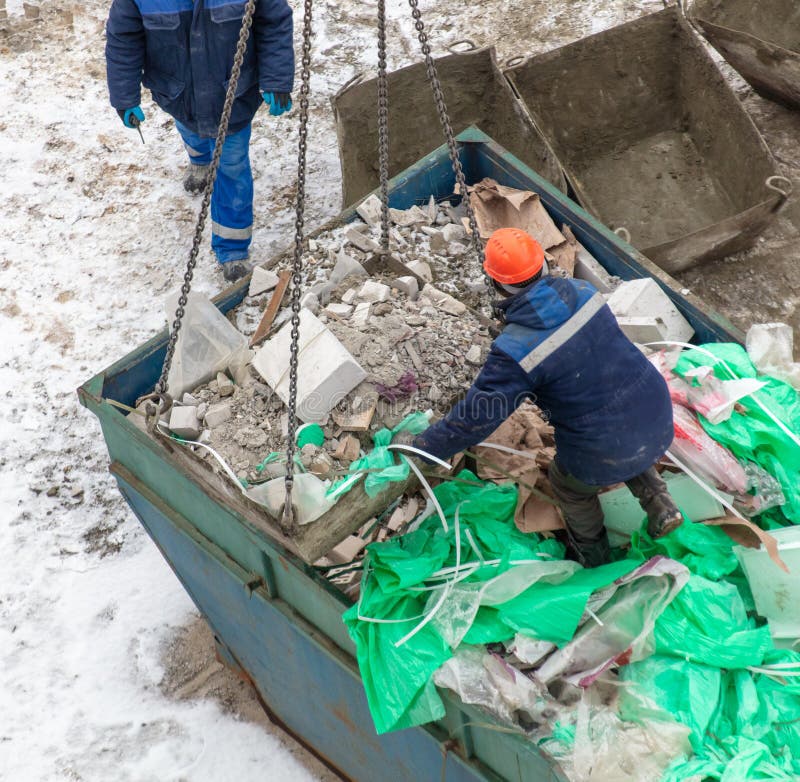 Unloading Garbage at a Construction Site with a Crane Stock Photo ...