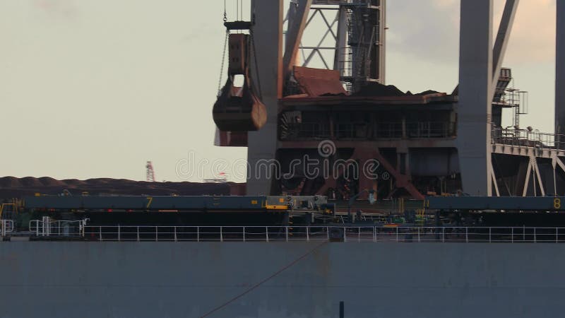 Unloading a huge coal ship stock footage. Video of industry - 164517640