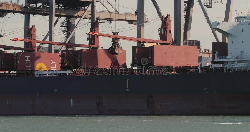 Unloading a huge coal ship stock video. Video of business - 176496257