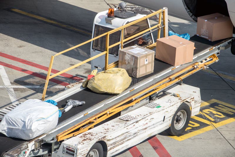 Aircraft unloading cargo stock photo. Image of engines - 2208416
