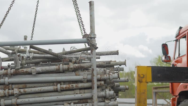 Crane Unloading Mechanism with Chains and Hooks. Unloading ...