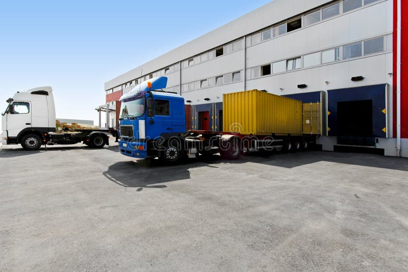 Cargo Terminal in a Large Warehouse Complex. Trucks Unload, Unloading ...