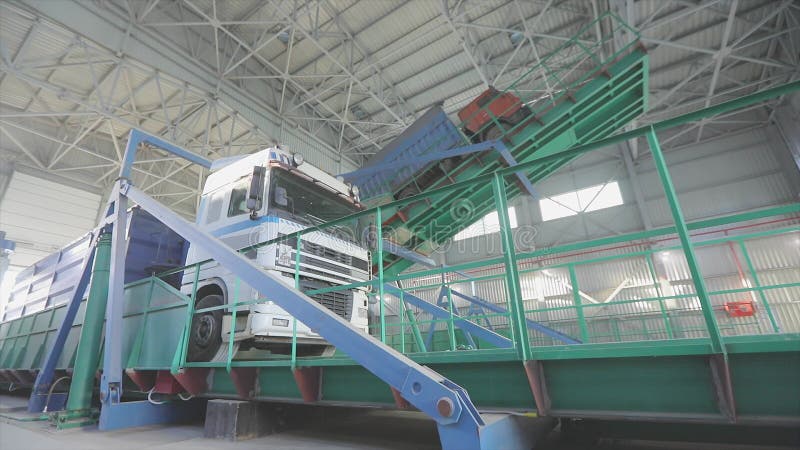 Unloading Wheat from a Truck To a Silo, Loading Wheat into an Elevator ...