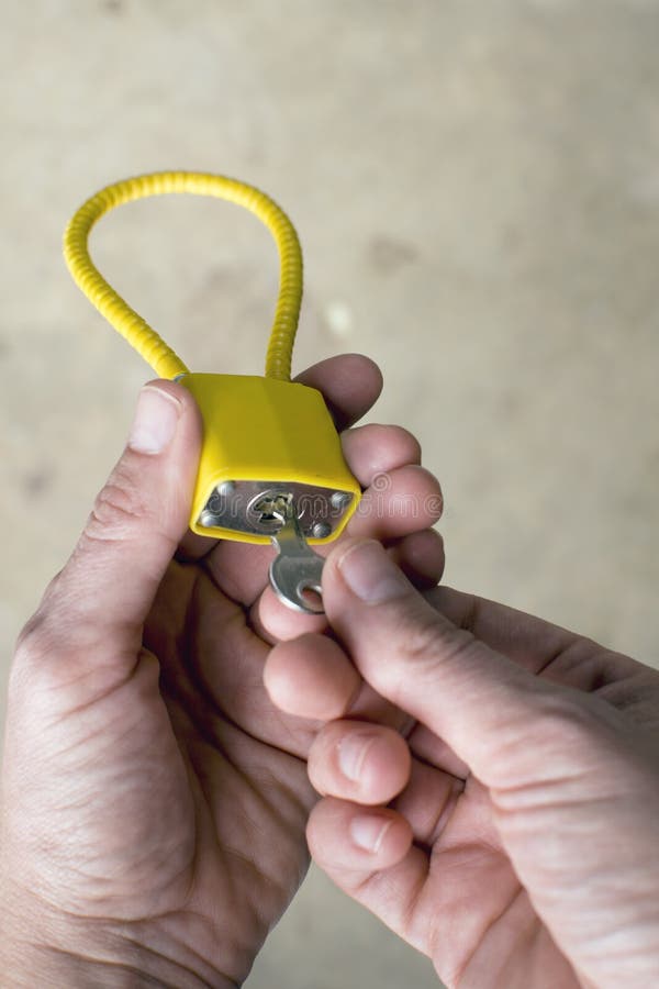Unlock yellow lock stock photo. Image of theft, studio - 46268740
