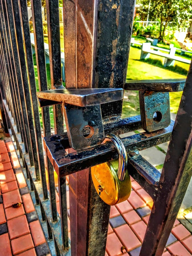 An Unlocked Gate of a Garden Stock Photo - Image of metallic, closed ...