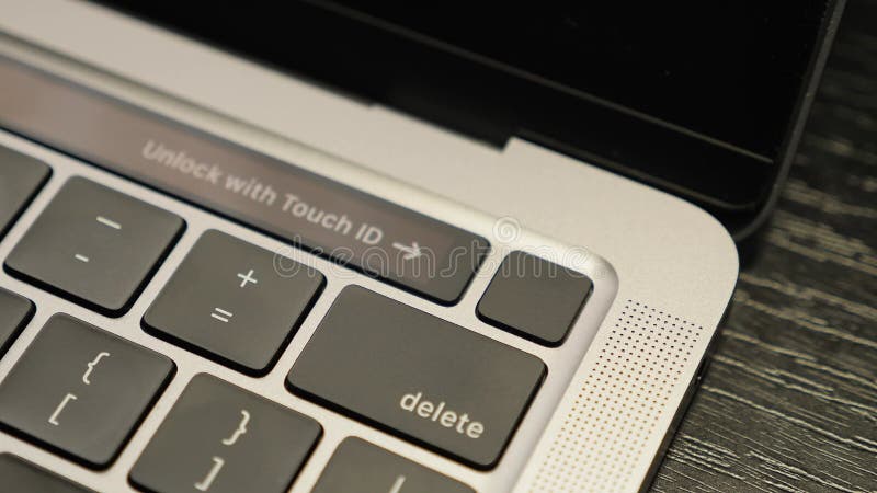 Unlocking Computer with Fingerprint Sensor. Touch ID on Laptop Stock ...