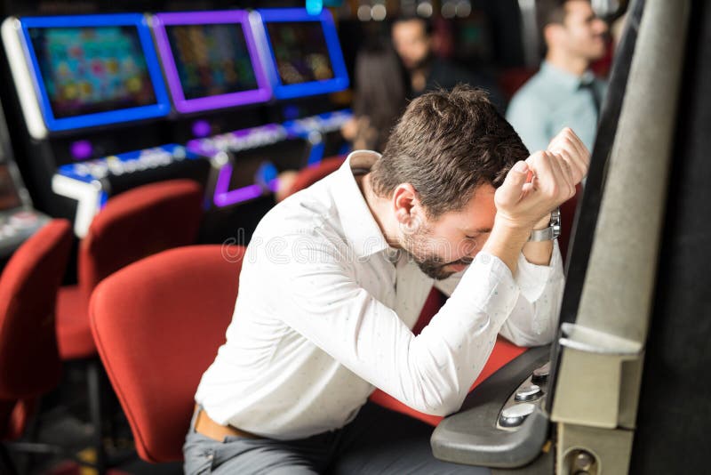 Stressed Man Losing Money In A Casino Stock Photo - Image of copy, club ... Stressed Man Losing Money In A Casino Stock Photo - Image of copy, club ...