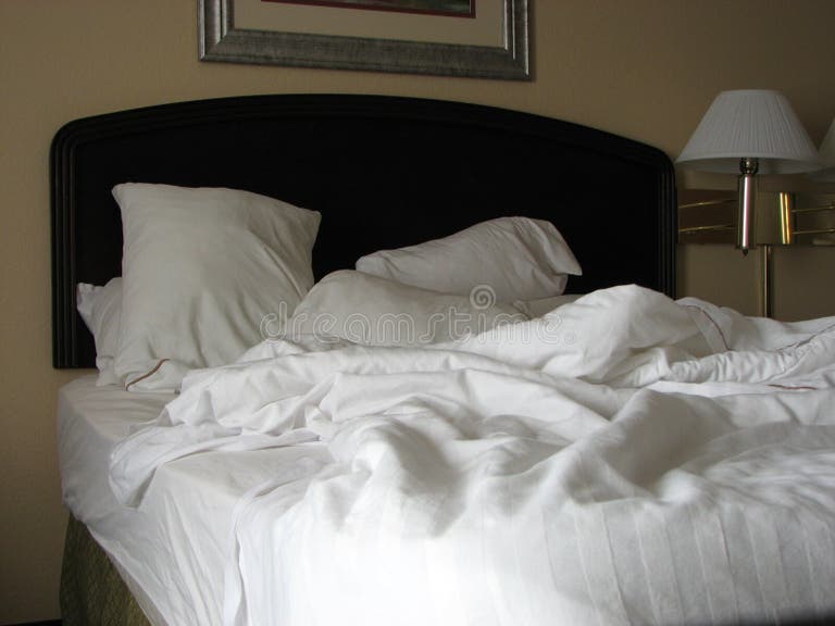 Unmade bed stock photo. Image of lamp, bedding, messy - 1965880