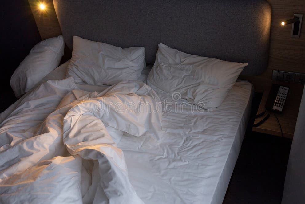 Unmade Bed in an Hotel Room. Stock Photo - Image of pillow, relax ...