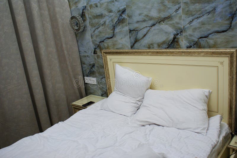 An Unmade Bed in a Hotel Room, a Wrinkled Bed. Stock Image - Image of ...