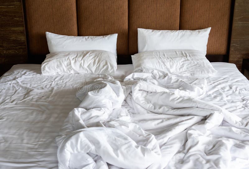 Unmade Bed with White Linens, Crumpled Empty and Messy Bed in Hotel ...