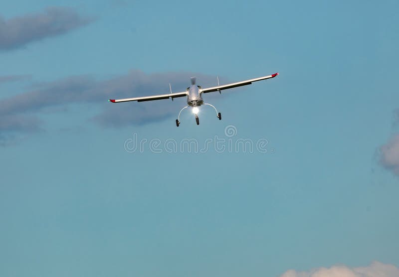 Unmanned Aerial Vehicle UAV in Blue Sky. Stock Image - Image of ...