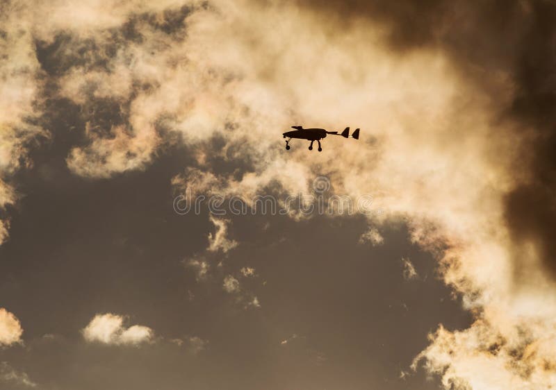 Unmanned Aerial Vehicle UAV in Blue Sky. Stock Photo - Image of ...