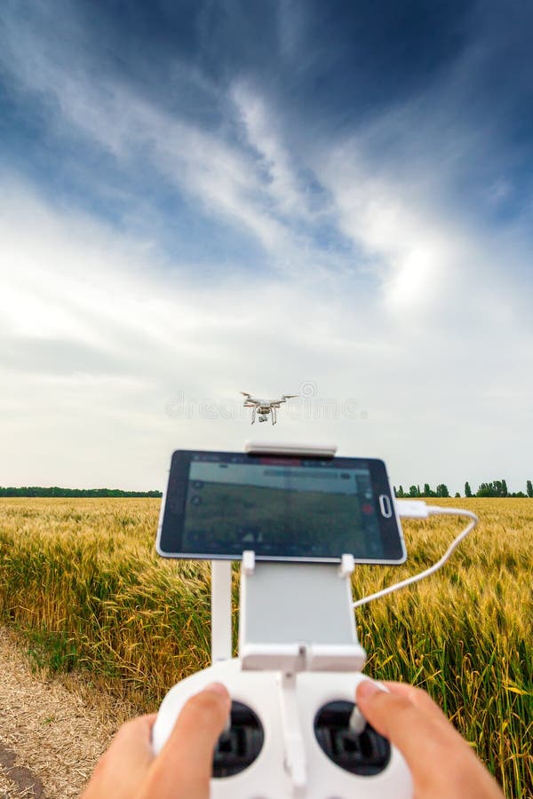 Unmanned Copter. Man Controls Quadrocopter Flight Stock Photo - Image ...