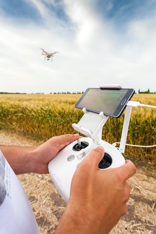 Unmanned Copter. Man Controls Quadrocopter Flight Stock Image - Image ...