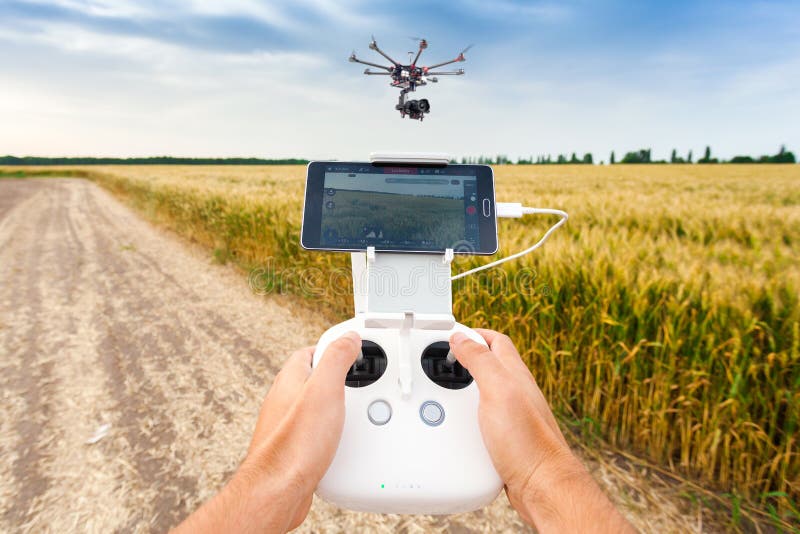 Unmanned Copter. Man Controls Quadrocopter Flight Stock Photo - Image ...