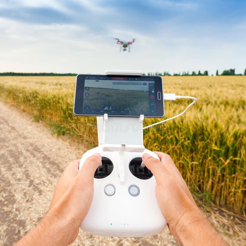 Unmanned Copter. Man Controls Quadrocopter Flight Stock Photo - Image ...